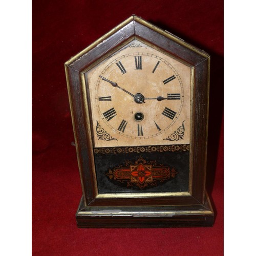 Small wooden mantle clock with inlaid front