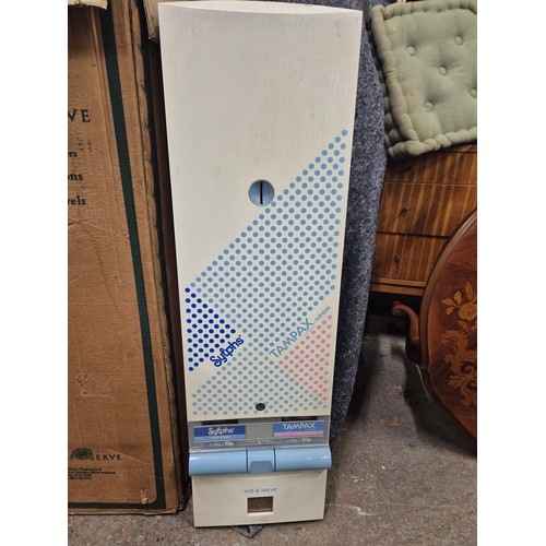 Self serve dispenser for Tampax and Simplicity towels