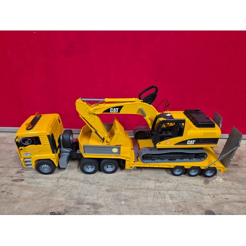 Large Bruder (German) CAT excavator and truck toy. 1:16 plastic scale ...