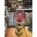 Victorian brass Globe Vulcan oil lamp, with an etched cranberry glass ...