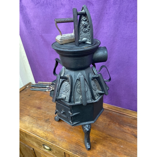 Victorian cast iron pot belly laundry stove, complete with 9 flat irons ...