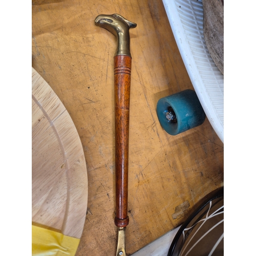 Decorative handle featuring a brass eagle head top