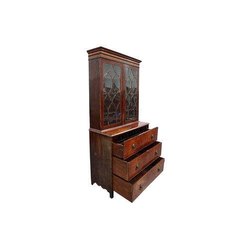 A 19th-century mahogany secretaire bookcase with tulip wood banded ...