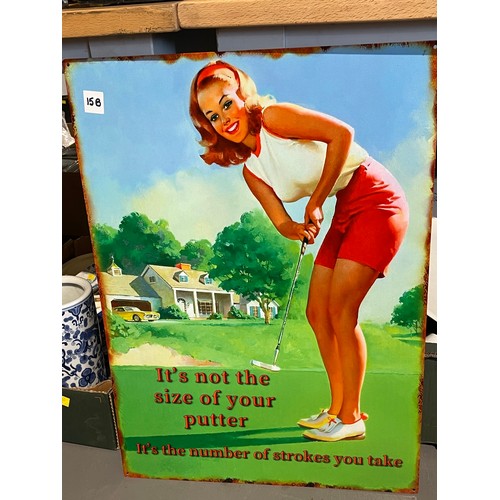 Metal sign. Lady golfer