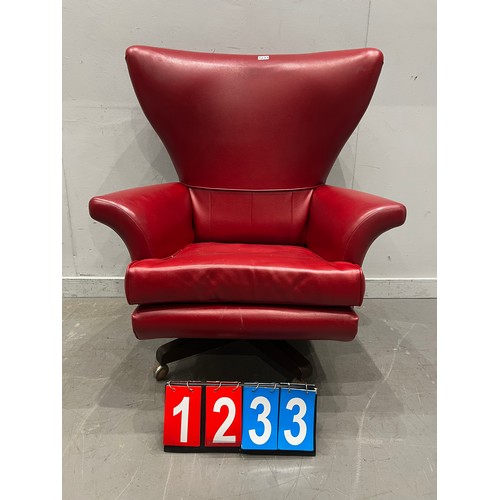 Mid century red leather wing back swivels chair