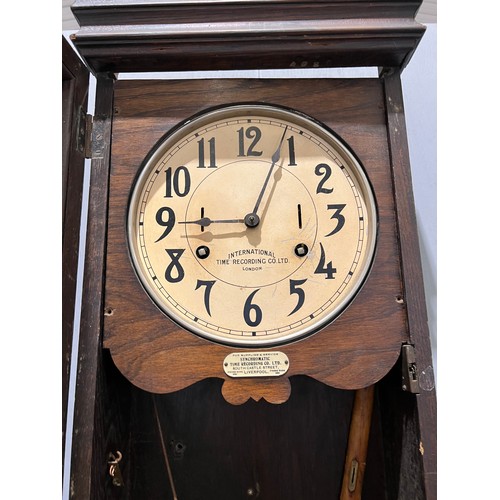 Early 20th century clocking in machine