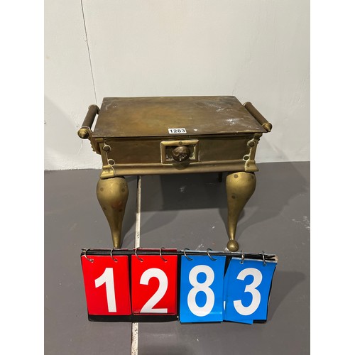 Early brass fire stool