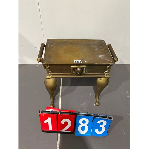 Early brass fire stool