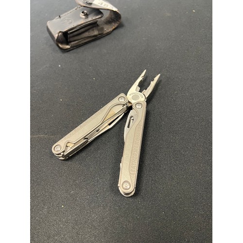 Titanium Leatherman charge multitool in case