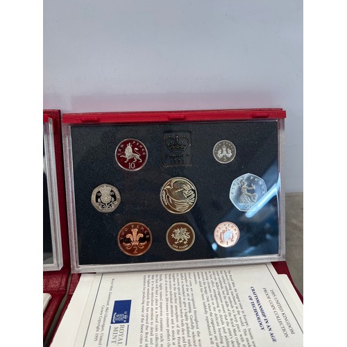 Two boxed Royal mint coin collections dating 1994 and 1995