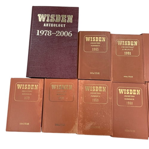 A collection of Wisden hardback books covering the years 1965, 1973 ...