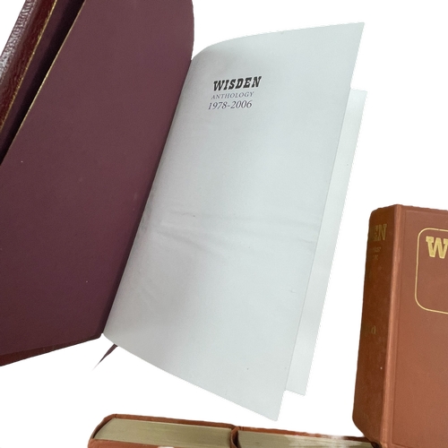 A collection of Wisden hardback books covering the years 1965, 1973 ...