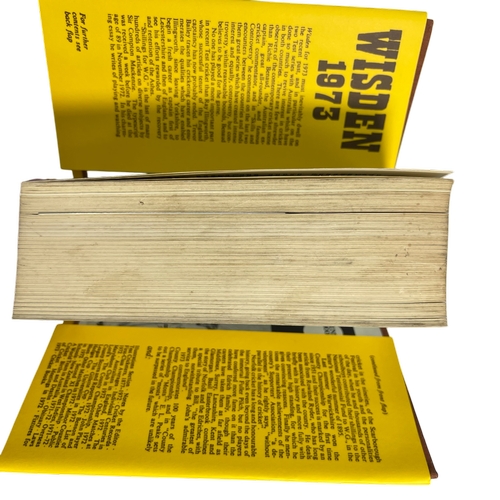 A collection of Wisden hardback books covering the years 1965, 1973 ...