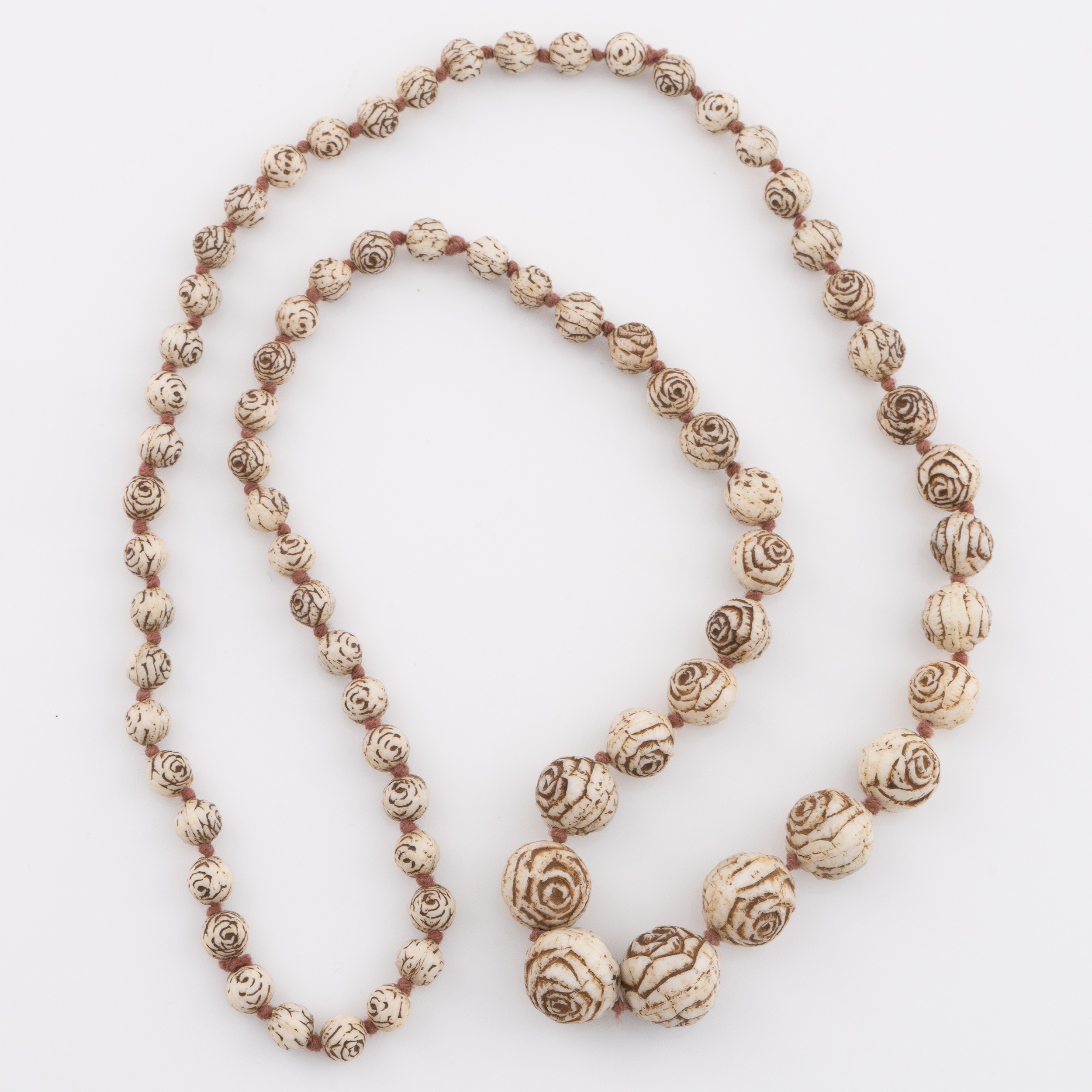 A 1930s Max Neiger Art Deco graduated glass bead necklace, decorated ...