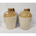 Near Pair of Stoneware Whisky Flagons, manufactured by a) Powell & b ...