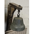 Antique Bronze Bell, stamped "21" (original clapper), hanging from a ...