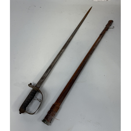 A VICTORIAN SWORD BY HENRY WILKINSON PALL MALL With original sheath ...