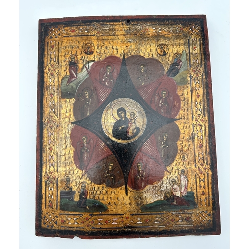 A 19TH CENTURY GREEK OR RUSSIAN ORTHODOX GILDED ICON ON WOOD DEPICTING ...