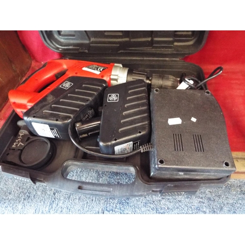 A Power Devil 30v cordless hammer drill with two batteries