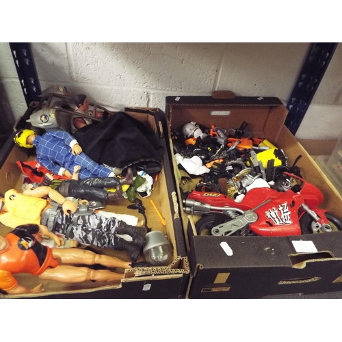 A large selection of assorted Action Man figurines and accessories in ...