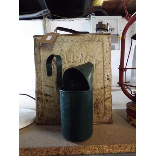 A vintage Shell jerry can and an oil can