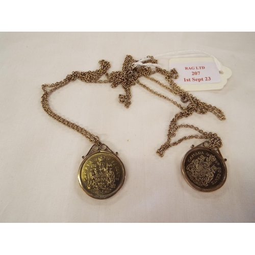 A pair of Canadian 50 cent pendants on silver chains