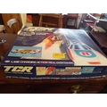 A boxed TCR Total Control Racing system lighted jam car speedway 23 feet