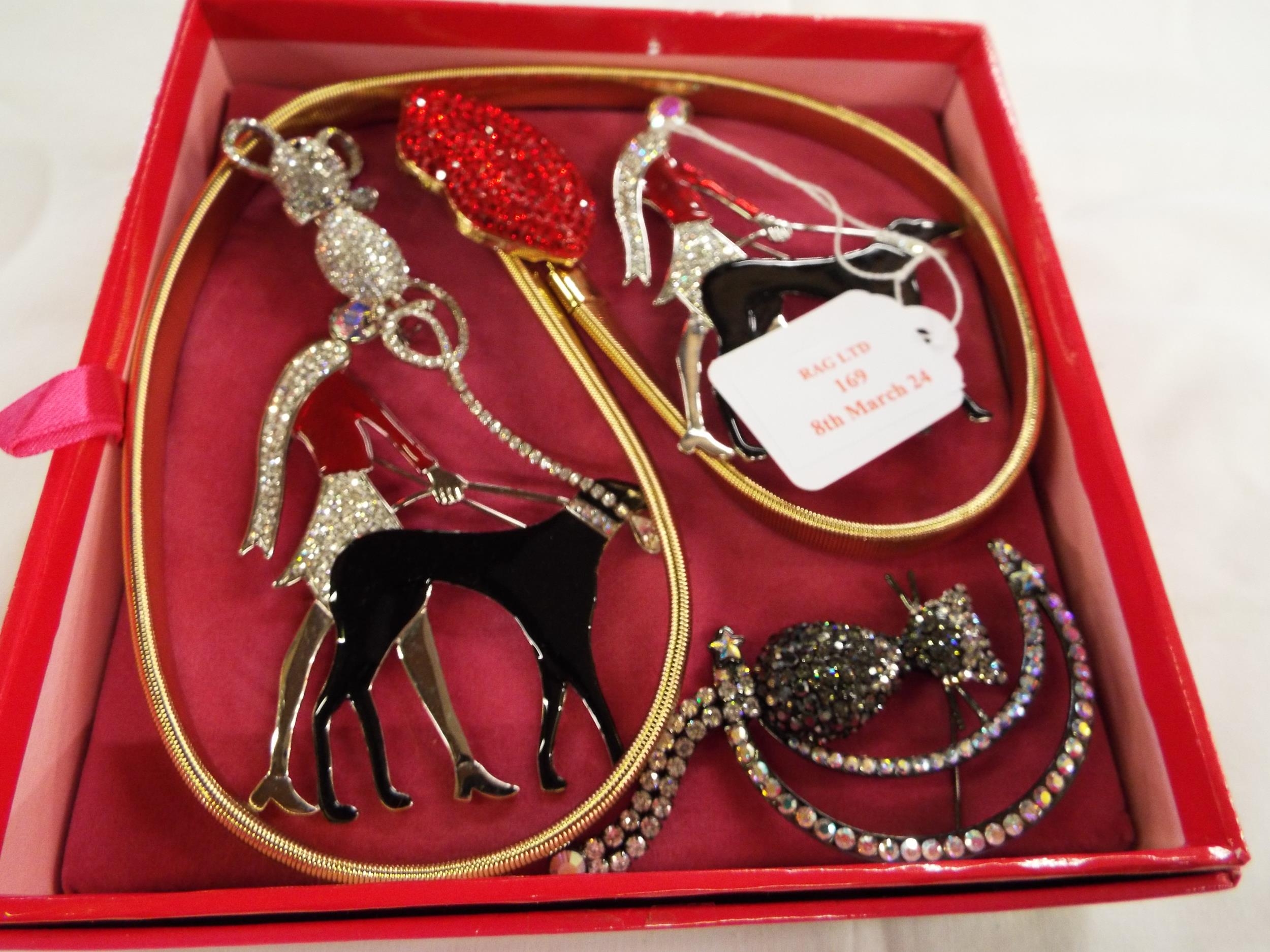 Four Butler & Wilson crystal fashion brooches in the form of Lady & dog ...