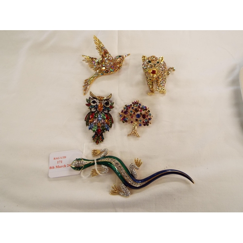 Three Butler & Wilson crystal fashion brooches in the form of a leopard ...