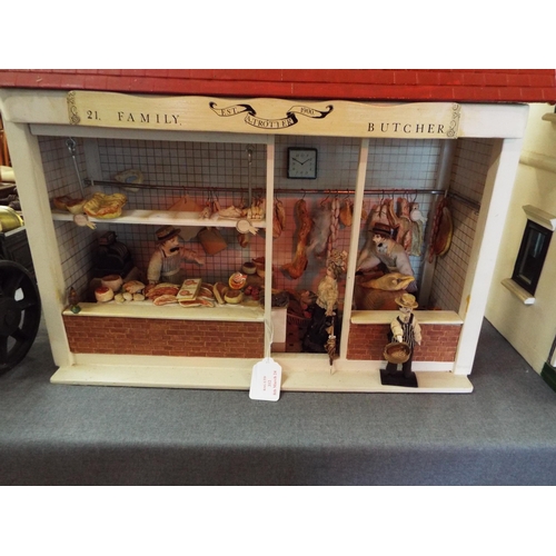 'A Trotter Family Butcher' dolls house together with accessories ...