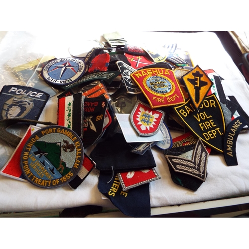 A mixed selection of assorted Police and Military cloth badges