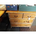 A Chinese style chest of two short and two long drawers with bamboo beading