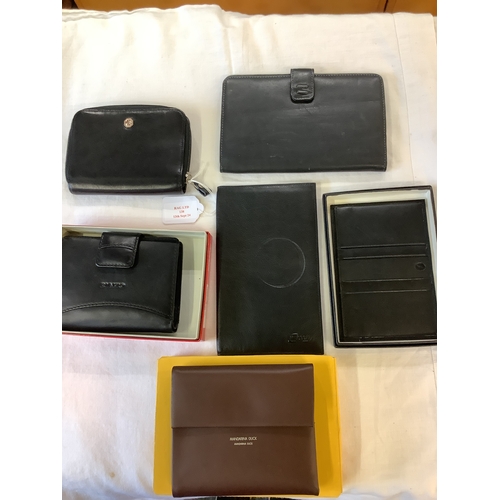 A mixed selection of designer wallets and purses to include Mandarine ...