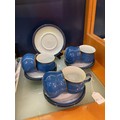 A blue glazed Denby tea set for six people