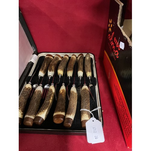 A boxed set of G B Wilson horn handled cutlery