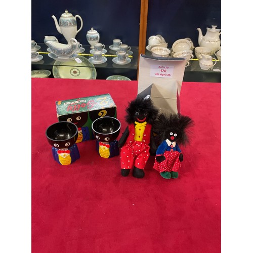 A selection of Golly items to include egg cup and two miniature Golly's
