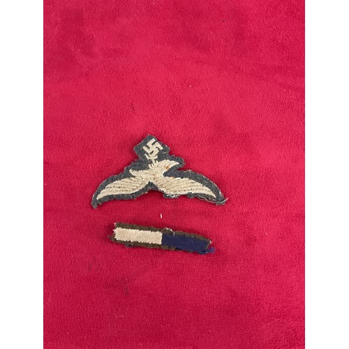 A WWII Luftwaffe M43 cap eagle insignia