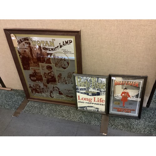 Two advertising mirrors and a framed advertising poster