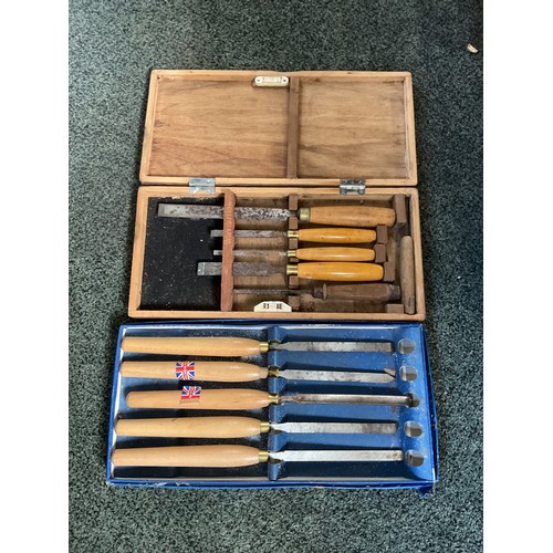 Two boxes of vintage wooden chisels