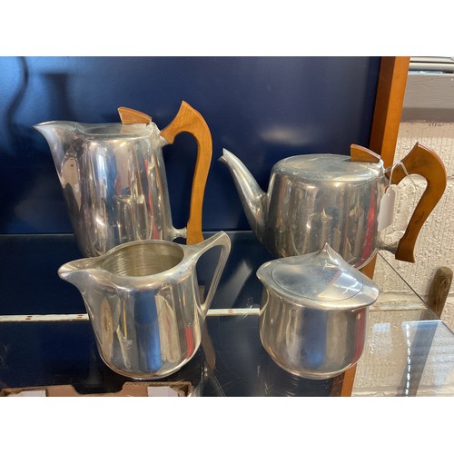 A vintage four piece Picquot-ware tea/coffee set