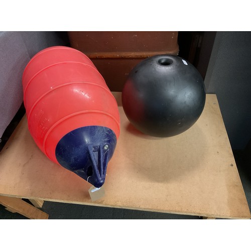 Two fishing buoys