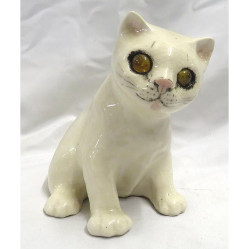 Winstanley Pottery Cat with amber eyes, white body, seated approx. 15cm H