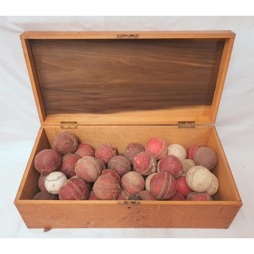 Wooden Box containing vintage cricket balls approx. 53cm x 28cm x 18cm