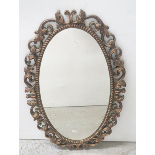 Oval Rococo Style Wall Mirror, dark gilt frame approx. 45cm x 72cm FW
