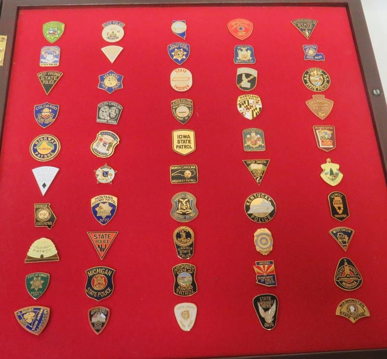 USA Police Badge Collection in display case