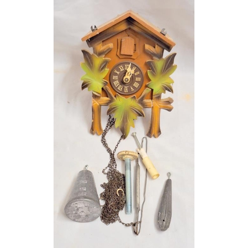 Cuckoo Clock with weights, decorated with leaves, no visible IDs (A13)