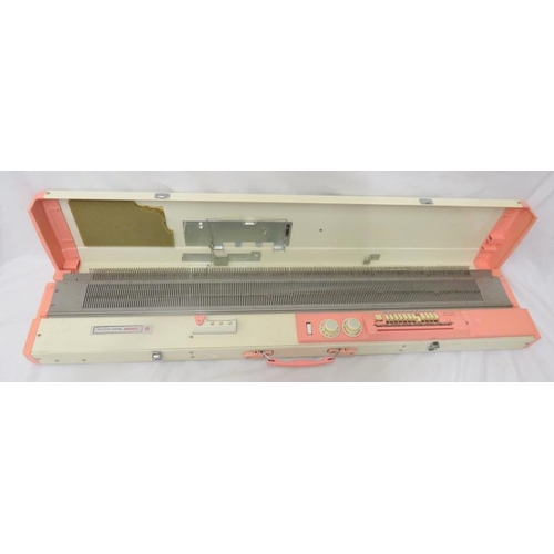 Singer Magic Memory Knitting Machine with pink terminals & box of ...