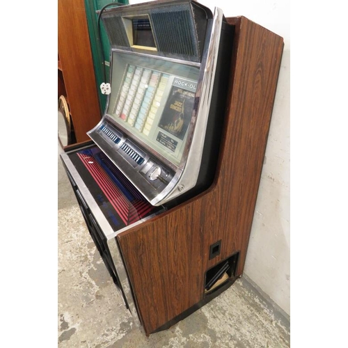 Rock-Ola Model no. 445 Juke Box, fully loaded with records/vinyls ...