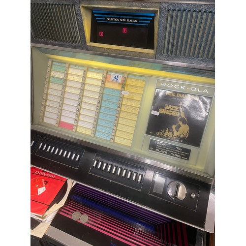 Rock-Ola Model no. 445 Juke Box, fully loaded with records/vinyls ...