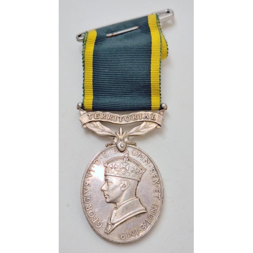 Silver Territorial George VI Medal for efficient service awarded to ...